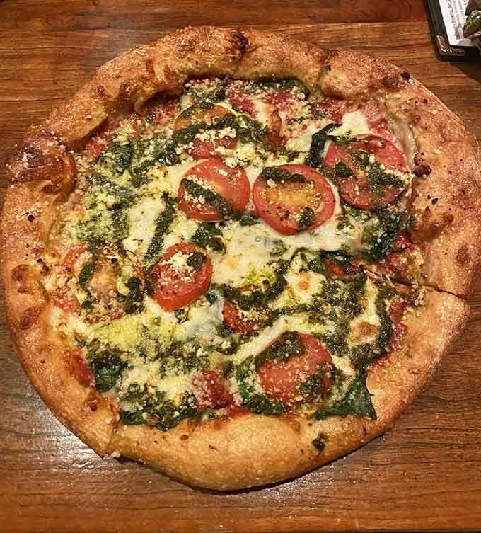 When your pizza arrives looking like a work of art, you almost feel guilty cutting into it. Almost.