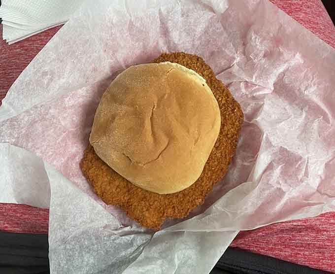 That breaded tenderloin is wider than the bun, which is exactly how Indiana likes it &ndash; unapologetically generous.