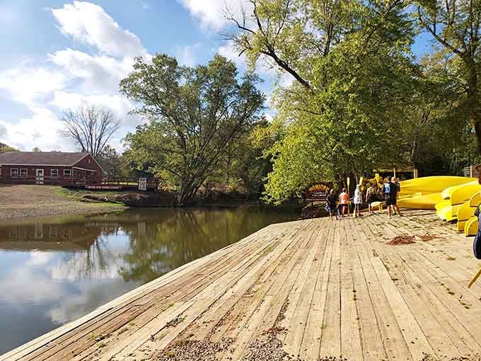 The wooden dock where your river journey begins, solid and welcoming like a good handshake.