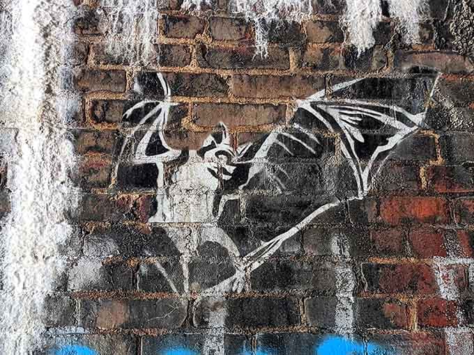 Even the graffiti gets spooky here, with bat artwork that seems oddly appropriate given the tunnel's permanent residents.