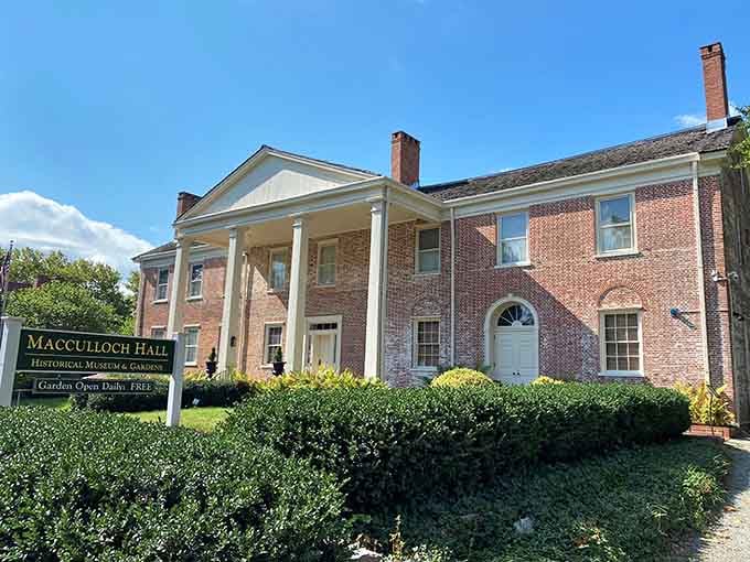 Colonial elegance meets perfectly manicured hedges, because even historical museums understand the importance of good landscaping.