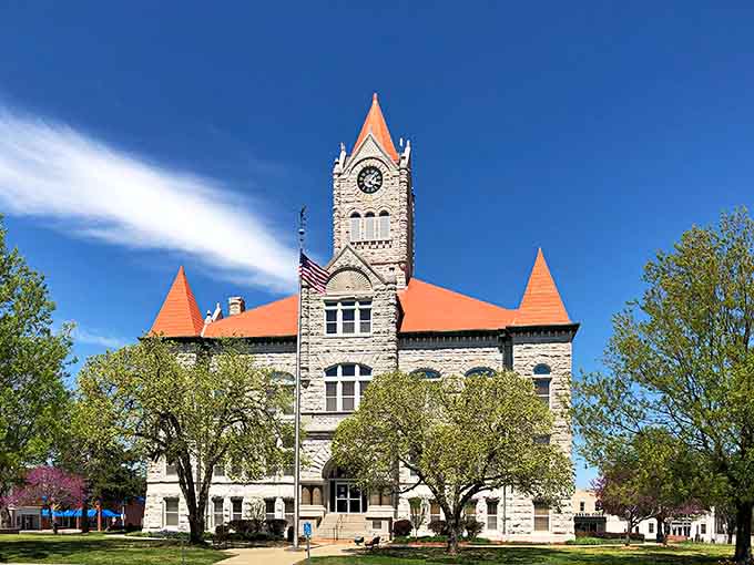 The Vernon County Courthouse stands proud with its orange-topped towers, looking like a castle that wandered into the Midwest.