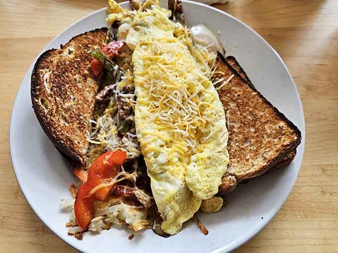 That omelette is fluffy perfection paired with hashbrowns that bring just enough heat to wake up your taste buds properly.