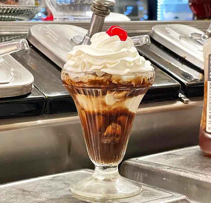Chocolate ice cream meeting soda in a tall glass, proving that fizzy and creamy make excellent dance partners.