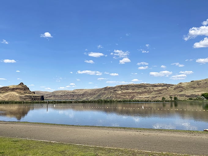 Still water reflecting ancient bluffs, the kind of peaceful scene that makes your blood pressure drop instantly.