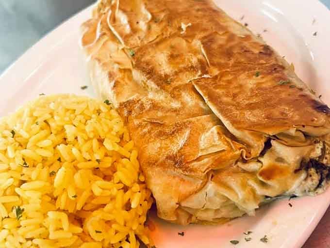 Flaky spinach pie brings Mediterranean sunshine to your plate, proving vegetables can be downright irresistible when done right.
