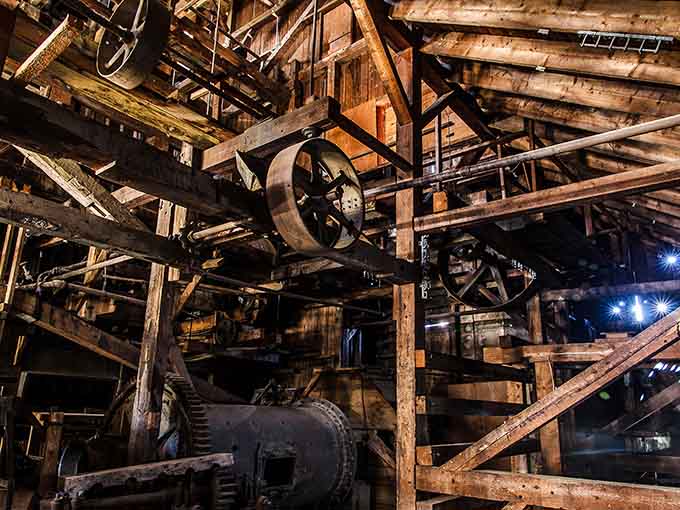 Pulleys and gears that once hummed with purpose now stand silent, telling stories without saying a word.