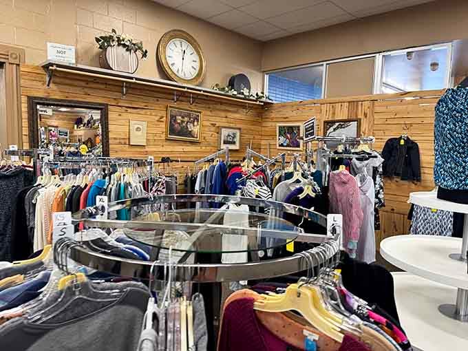 Circular racks overflow with clothing possibilities, each garment waiting to become someone's new favorite piece in their wardrobe rotation.