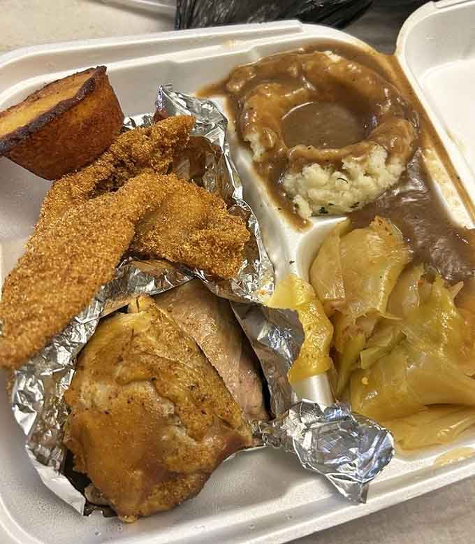 Fried catfish so perfectly golden it practically glows, surrounded by sides that complete the Southern comfort symphony beautifully.
