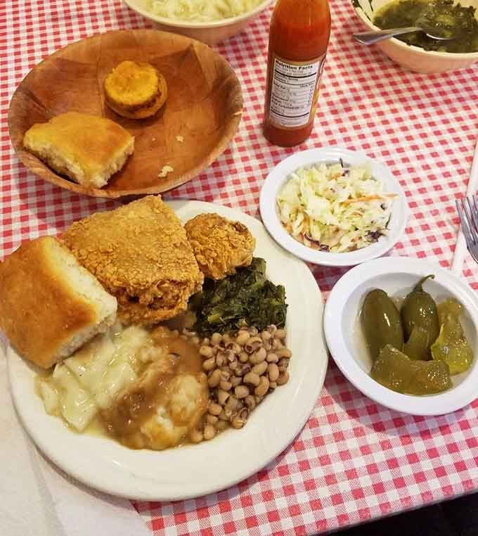 This spread of chicken, sides, and bread products represents everything good about Southern cooking in one glorious, calorie-dense tableau.