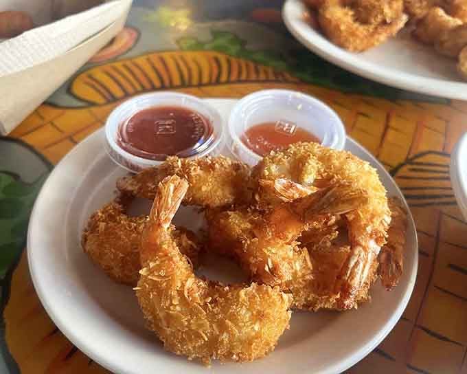 Coconut shrimp so perfectly golden, they could moonlight as edible jewelry at a beach wedding.