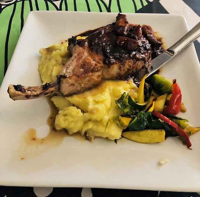 That glossy glaze on succulent pork paired with buttery potatoes is pure comfort on a single plate.