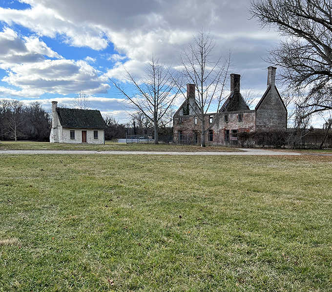Colonial architecture standing proud against dramatic skies proves history has excellent taste in real estate locations.