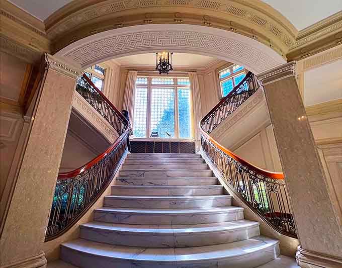 This grand staircase has seen more drama than a season of Downton Abbey, paranormal activity included.