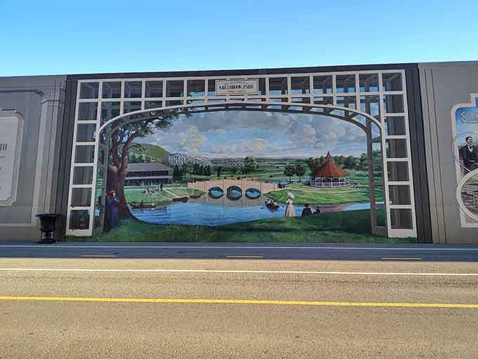 Millbrook Park looks so inviting, you might forget you're staring at a floodwall instead of an actual bridge.
