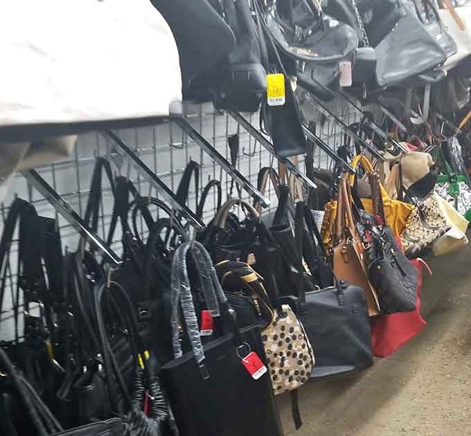 Handbags dangle like fashion fruit ripe for picking, each one ready to carry your essentials with unexpected style.
