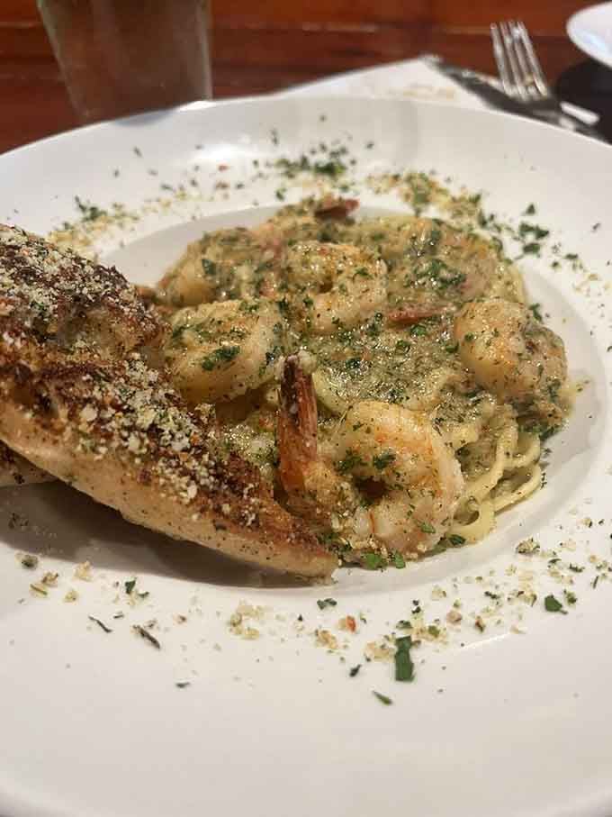 Garlic shrimp swimming in butter over linguini&mdash;your cardiologist might object, but your taste buds will throw a parade.