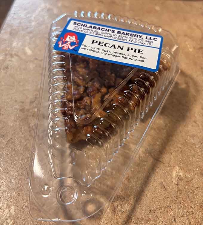 Pecan pie in its natural habitat, ready to make your taste buds sing old-timey hymns of gratitude.