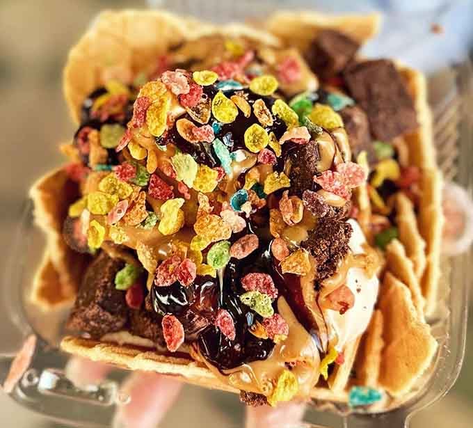 Fruity Pebbles and brownie chunks transform these nachos into a breakfast-dessert hybrid that Fred Flintstone would absolutely approve.