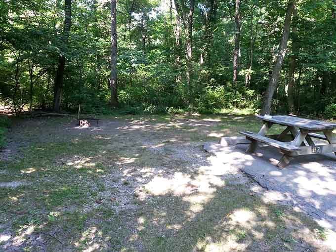 Your campsite awaits, complete with a picnic table and fire ring, because roughing it doesn't mean giving up s'mores entirely.