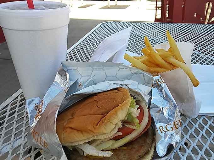 That bacon-topped beauty sitting on a metal table never looked so good or tasted so right.