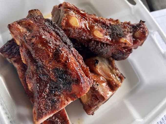 These ribs have the kind of char and glaze that make grown adults forget their table manners.