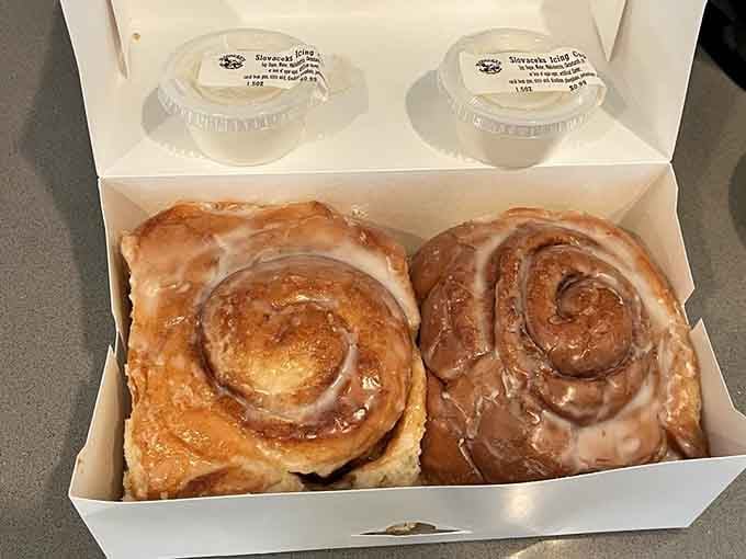 Cinnamon rolls the size of your head, dripping with icing and completely unapologetic about their generous proportions.