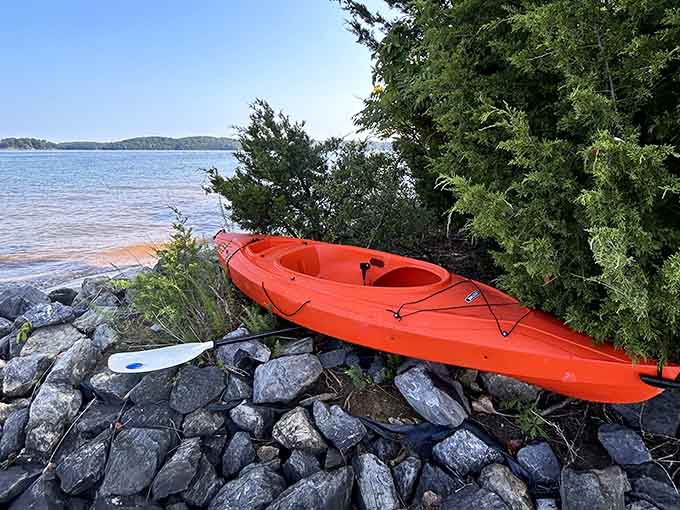 That orange kayak isn't just resting, it's waiting for your next adventure along 500 miles of pristine shoreline.