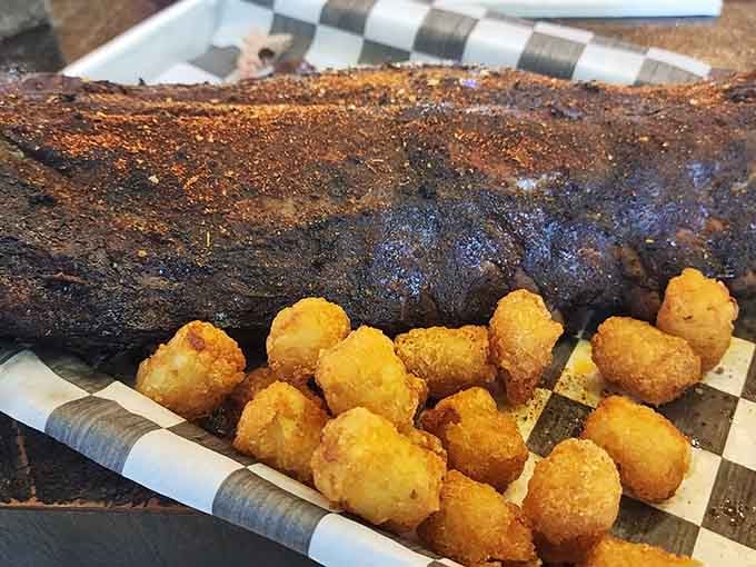 A full rack of ribs with mac and cheese bites proves that excess can be absolutely glorious.