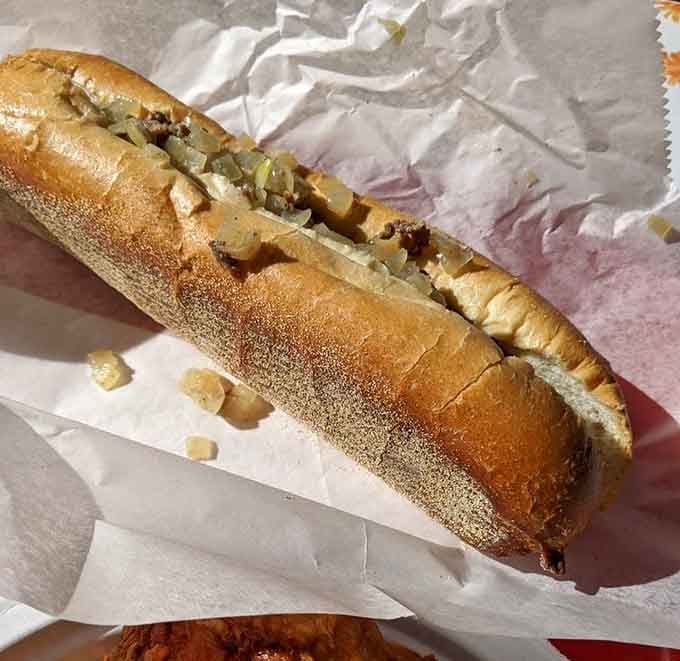 That cheese steak comes loaded with everything you need and nothing you don't, simple excellence on a roll.