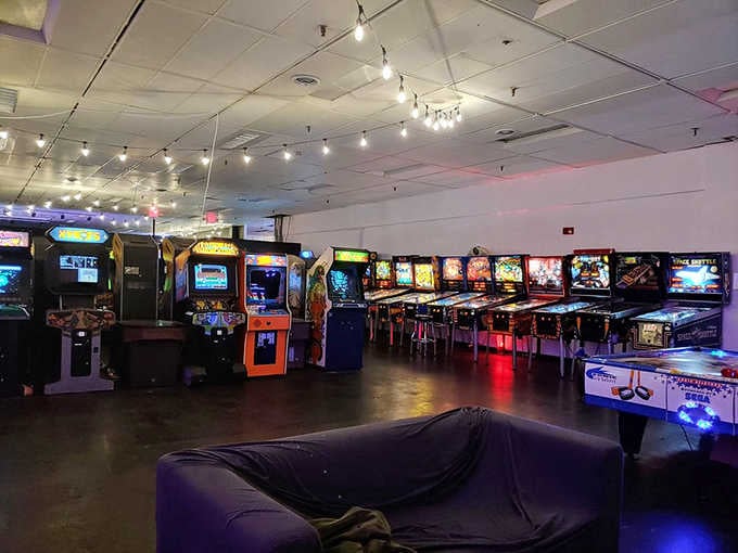 String lights and vintage cabinets create an atmosphere that's part nostalgia, part sophisticated adult playground.