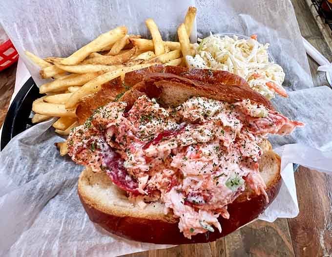 This lobster roll overflows with sweet meat, making you wonder why anyone settles for less generous portions elsewhere.