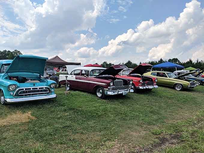 Classic car enthusiasts turn the drive-in into a rolling museum, proving style never goes out of fashion.