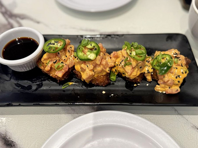 Crispy rice topped with spicy tuna proves that sometimes the best things come in bite-sized, jalape&ntilde;o-garnished packages of joy.