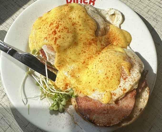 Eggs Benedict smothered in hollandaise sauce – because sometimes you need breakfast to feel like a special occasion.