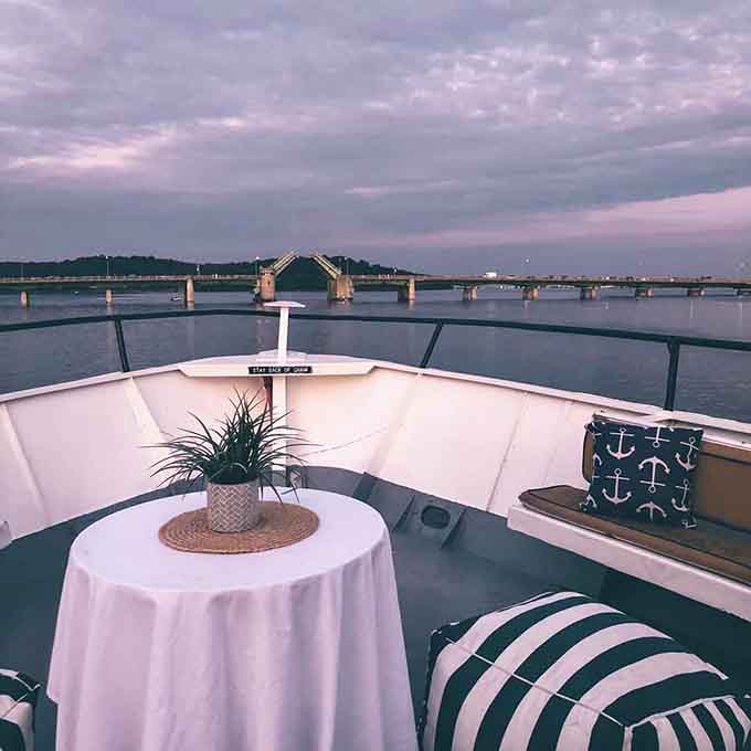 Sunset dining on deck where the ambiance does all the heavy lifting for your Instagram feed.