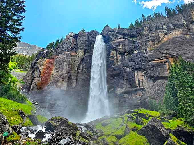 Bridal Veil Falls plunges 365 feet of pure Colorado snowmelt, creating its own weather system of mist and rainbows.