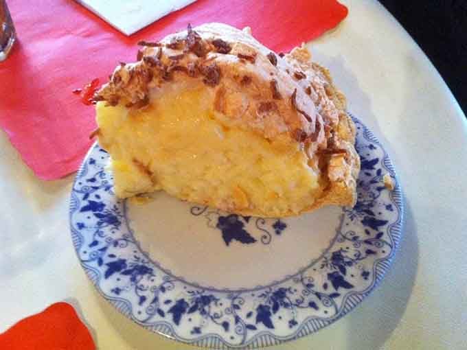 That towering coconut cream pie stands taller than most people's willpower, and twice as tempting.
