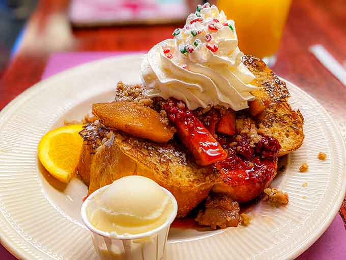French toast topped with strawberries and whipped cream: because sometimes breakfast needs to feel like a celebration.
