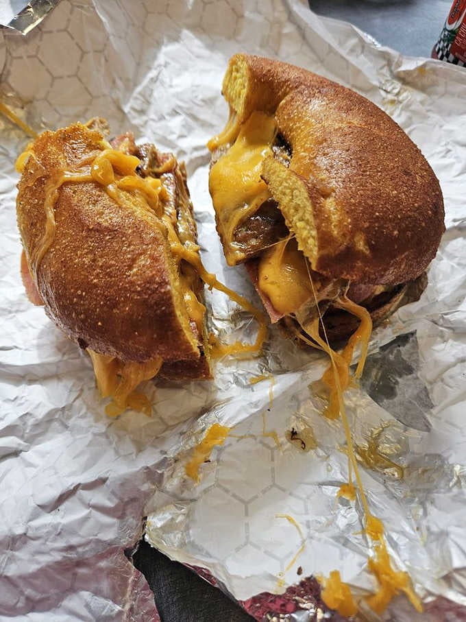 When a bagel sandwich achieves this level of cheese pull, you know you've found something truly special and delicious.