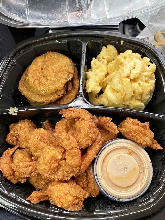 Fried shrimp with fried green tomatoes proves that sometimes doubling down on deliciousness is the only logical choice.