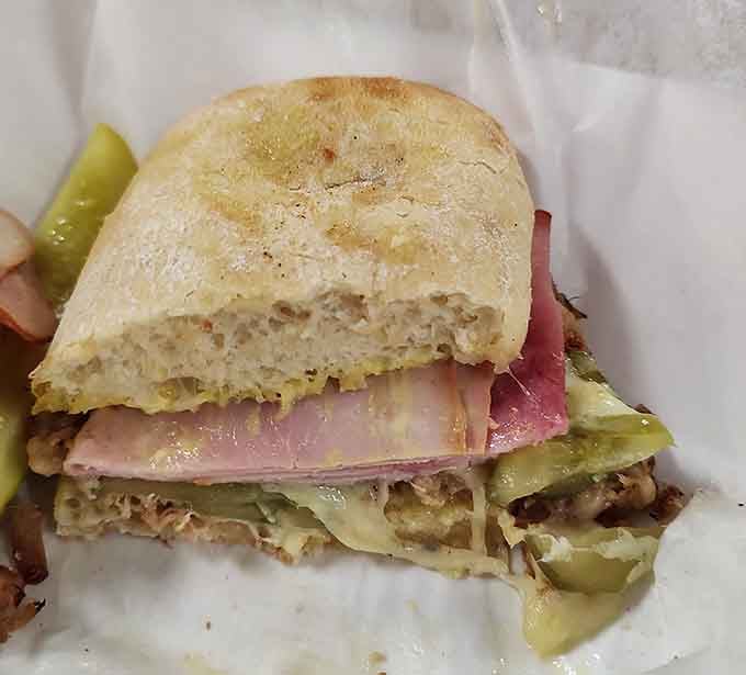 Layers of meat stacked this high require strategic planning, structural engineering, and possibly a dislocated jaw to conquer.