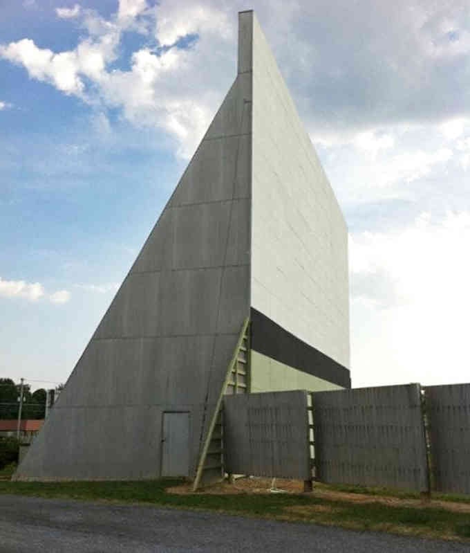 The screen's massive concrete structure stands like a monument to American entertainment history, still going strong.