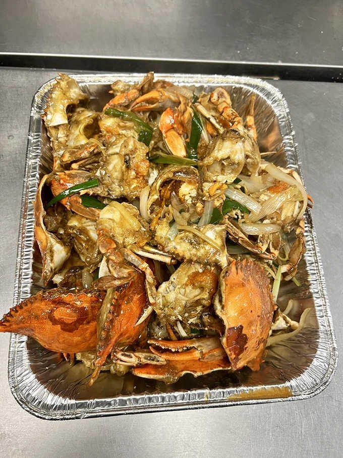 Blue crabs tumbled with aromatics in their foil throne, proving good things come to those who crack shells.