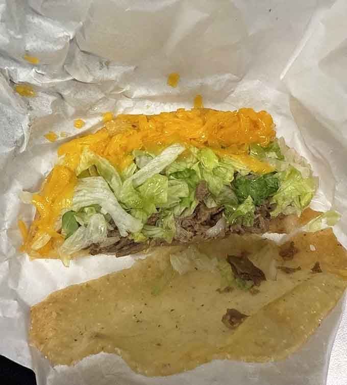 Shredded beef, melted cheese, and crisp lettuce on that legendary tortilla create a taco worth crossing town for repeatedly.