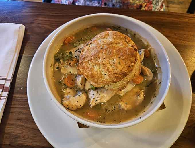 Chicken pot pie topped with golden pastry that makes you understand why comfort food earned its name in the first place.