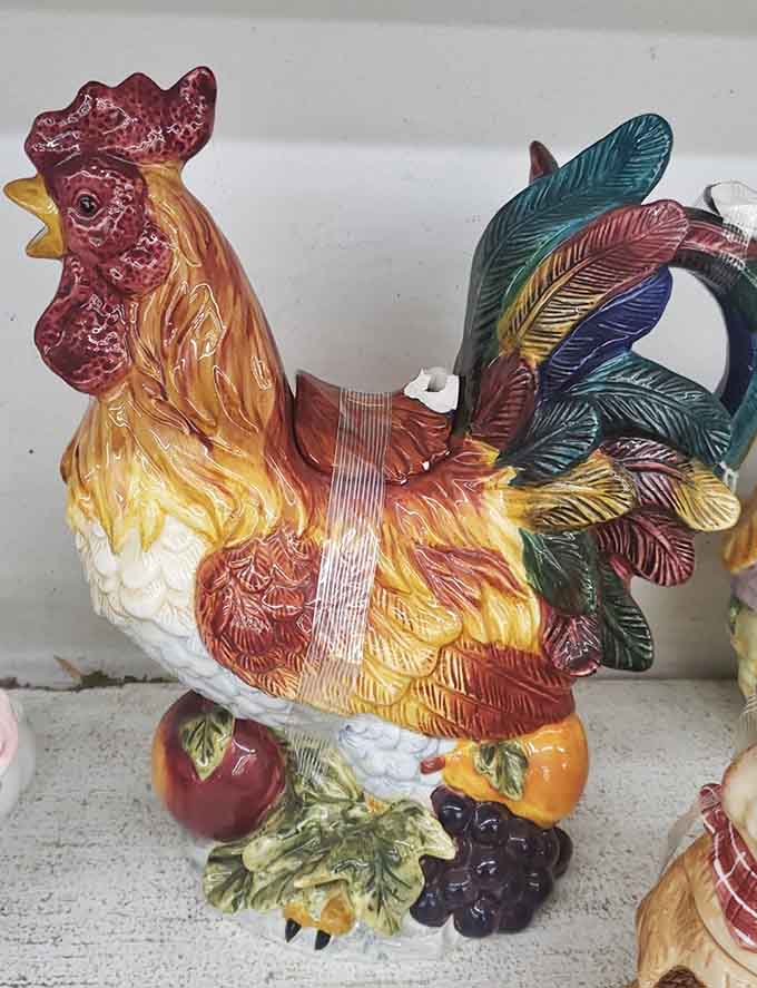 This rooster means business, strutting its ceramic stuff like it's auditioning for a spot on your kitchen counter.