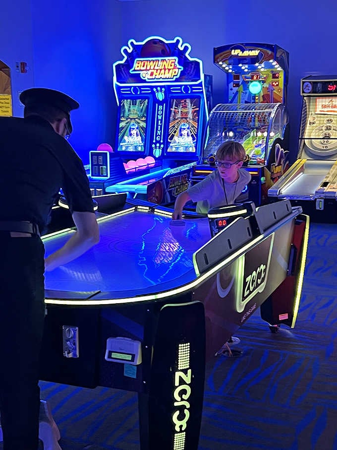 Air hockey tables keep the competitive spirit alive when children need a break from their vehicular responsibilities.