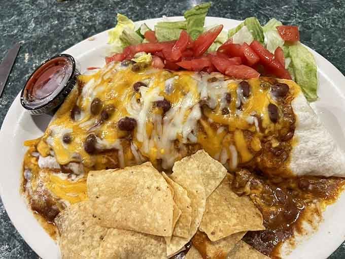 A burrito smothered in chili and cheese: because sometimes subtlety is overrated and your taste buds deserve a party.