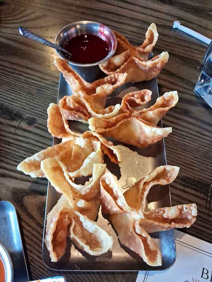 Crispy, golden wontons hiding creamy crab filling make the perfect start to any meal worth remembering.